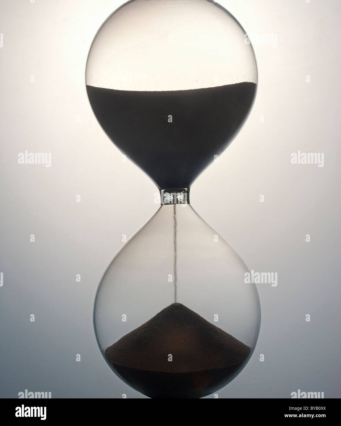 Hour glass with sand Stock Photo - Alamy