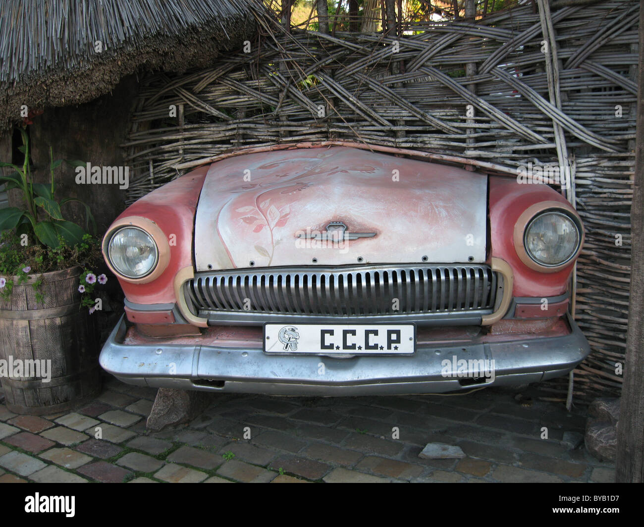 CCCP old car in woven fence in kiev Stock Photo - Alamy