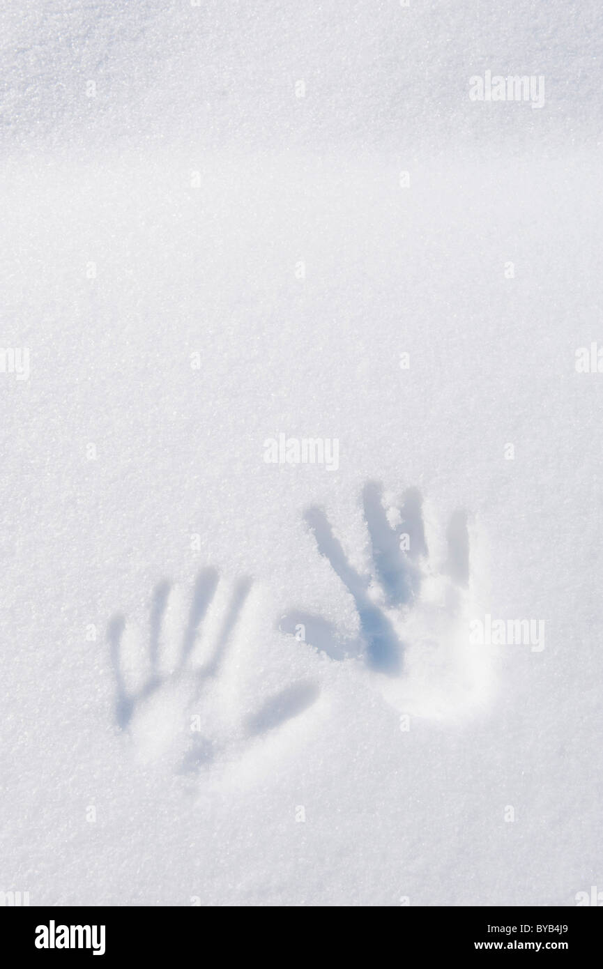 Handprint in the snow hand print imprint snow hi-res stock photography ...