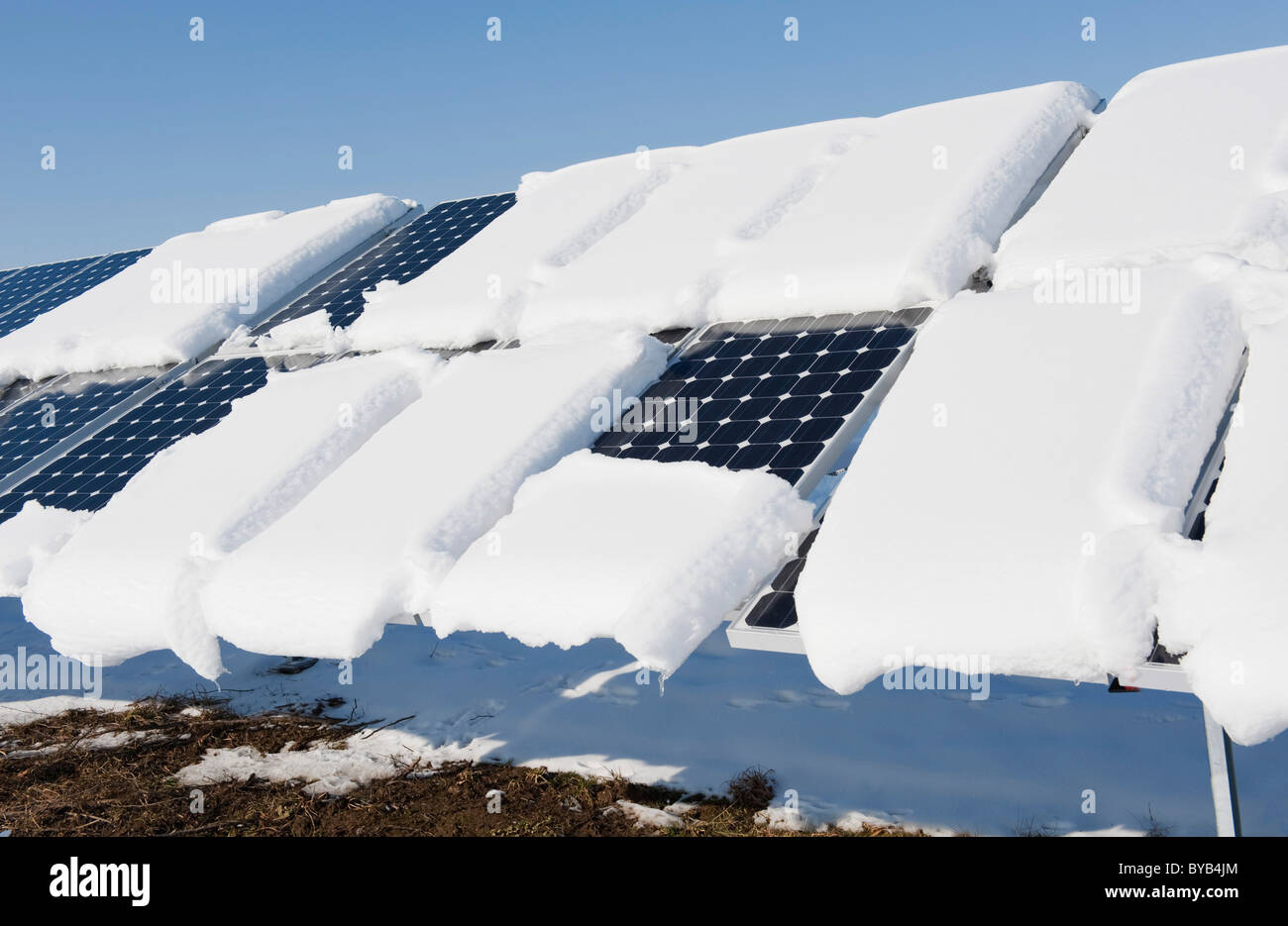 Snow sliding off solar modules in winter, Landshut, Lower Bavaria ...