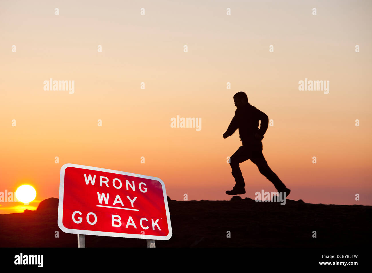 A man fell running on Red Screes at sunset in the Lake district ...