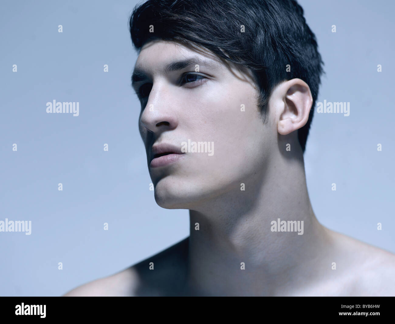 Portrait of a young man, cool tone Stock Photo - Alamy