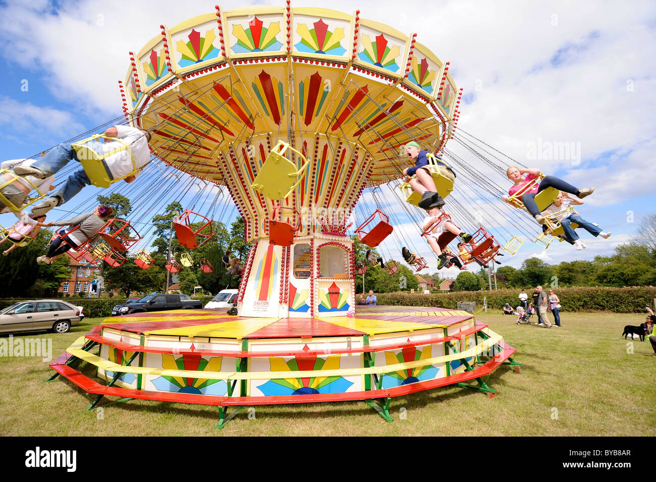 The Chair-O-Planes, sometimes called a swing carousel or wave swinger ...