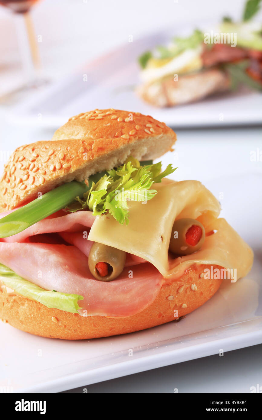Sesame seed bun with ham and cheese Stock Photo - Alamy