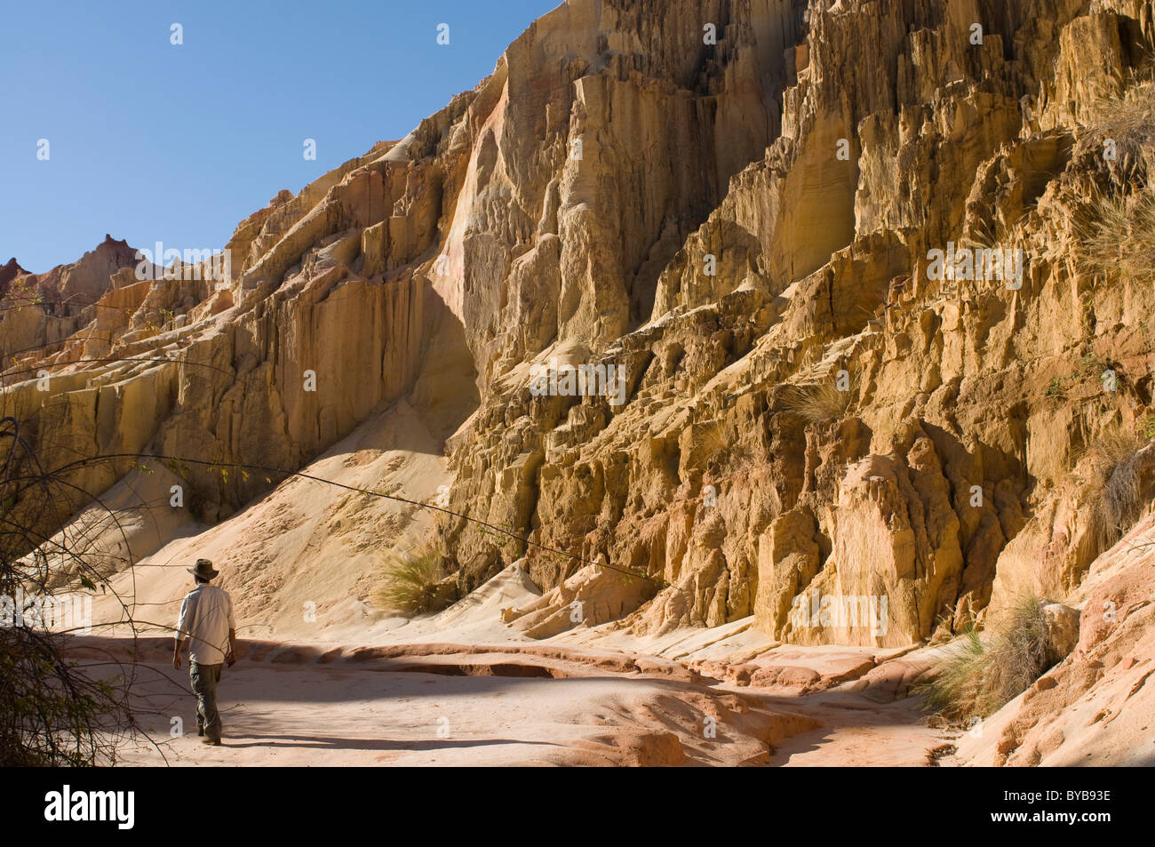 Man walking through rocks hi-res stock photography and images - Alamy