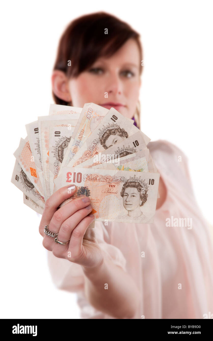 Sterling notes in hand hi-res stock photography and images - Alamy