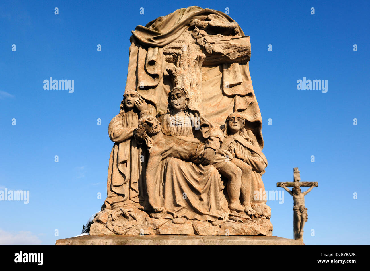 Deposition from the Cross, religious stone relief in a cemetery ...
