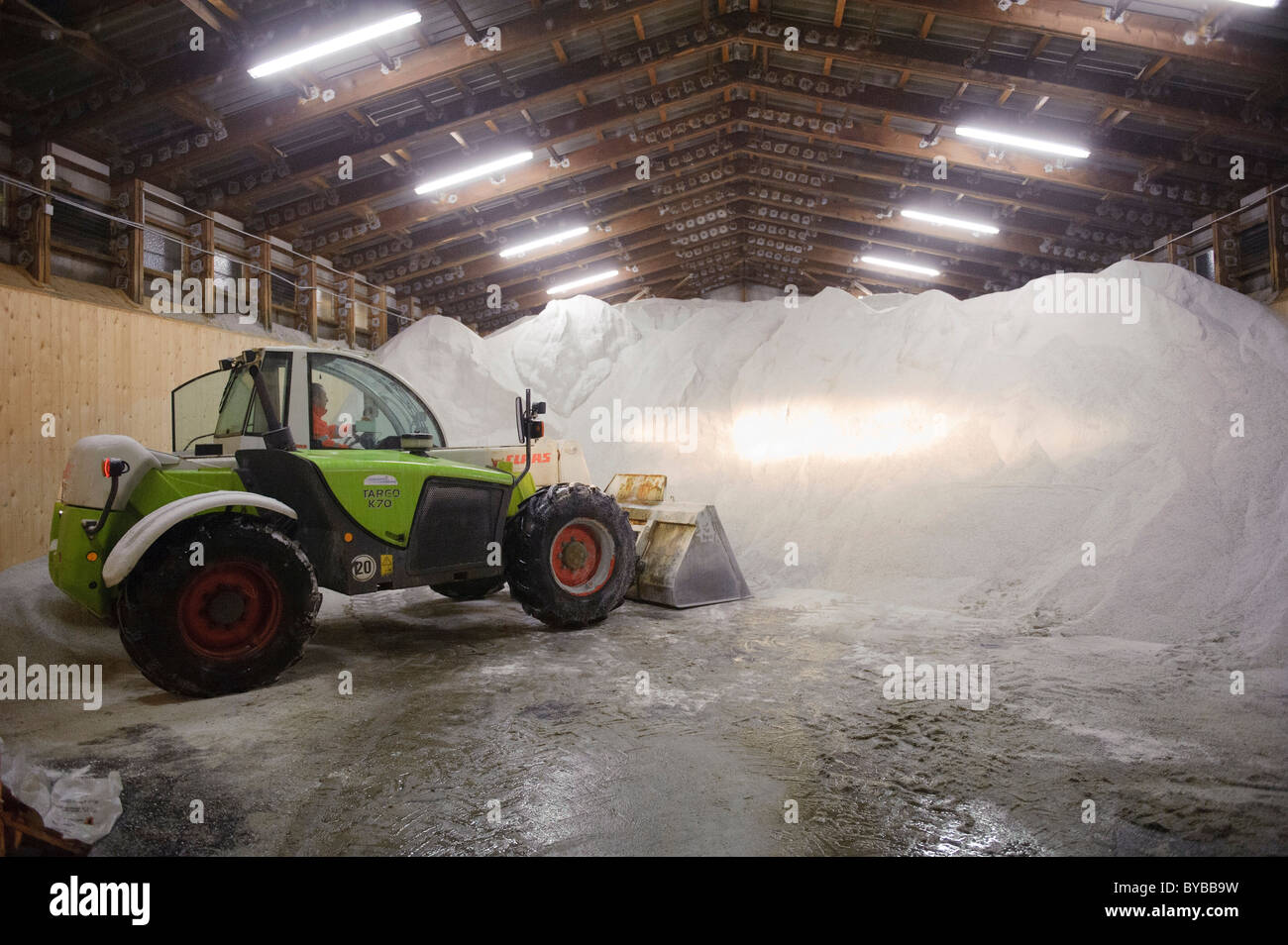 Winter services vehicles are loaded with road salt at the salt storage ...