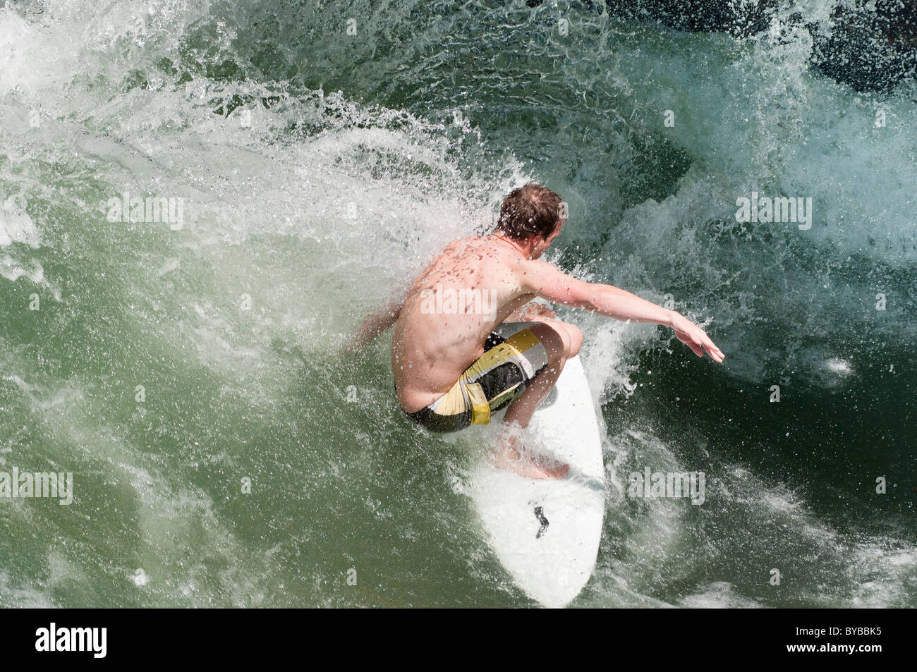River surfing on the Eisbach in Munich, Germany Stock Photo - Alamy