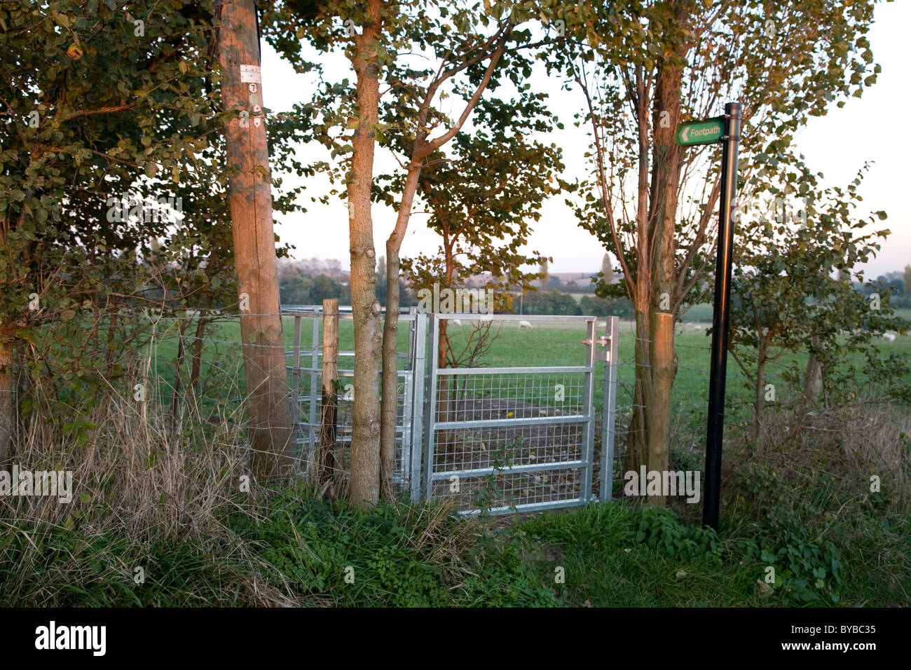 Gate to a public footpath across private land in England Stock Photo ...