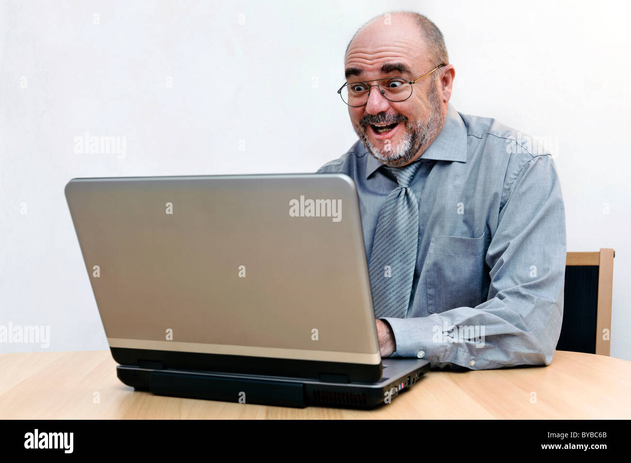 A senior citizen surfing the web enthusiastically Stock Photo - Alamy