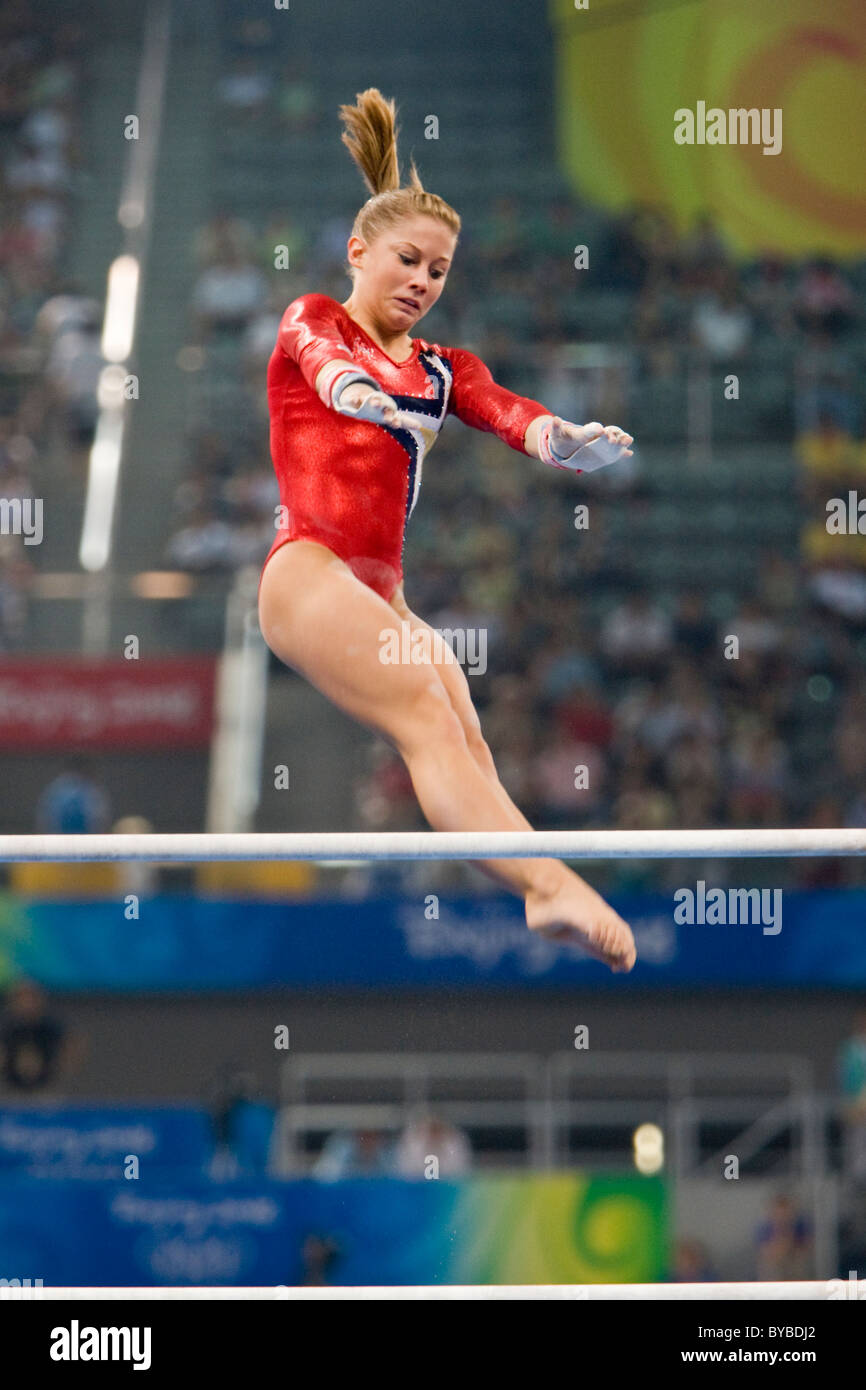 Shawn Johnson (USA) competing in the gymnastic qualification ...