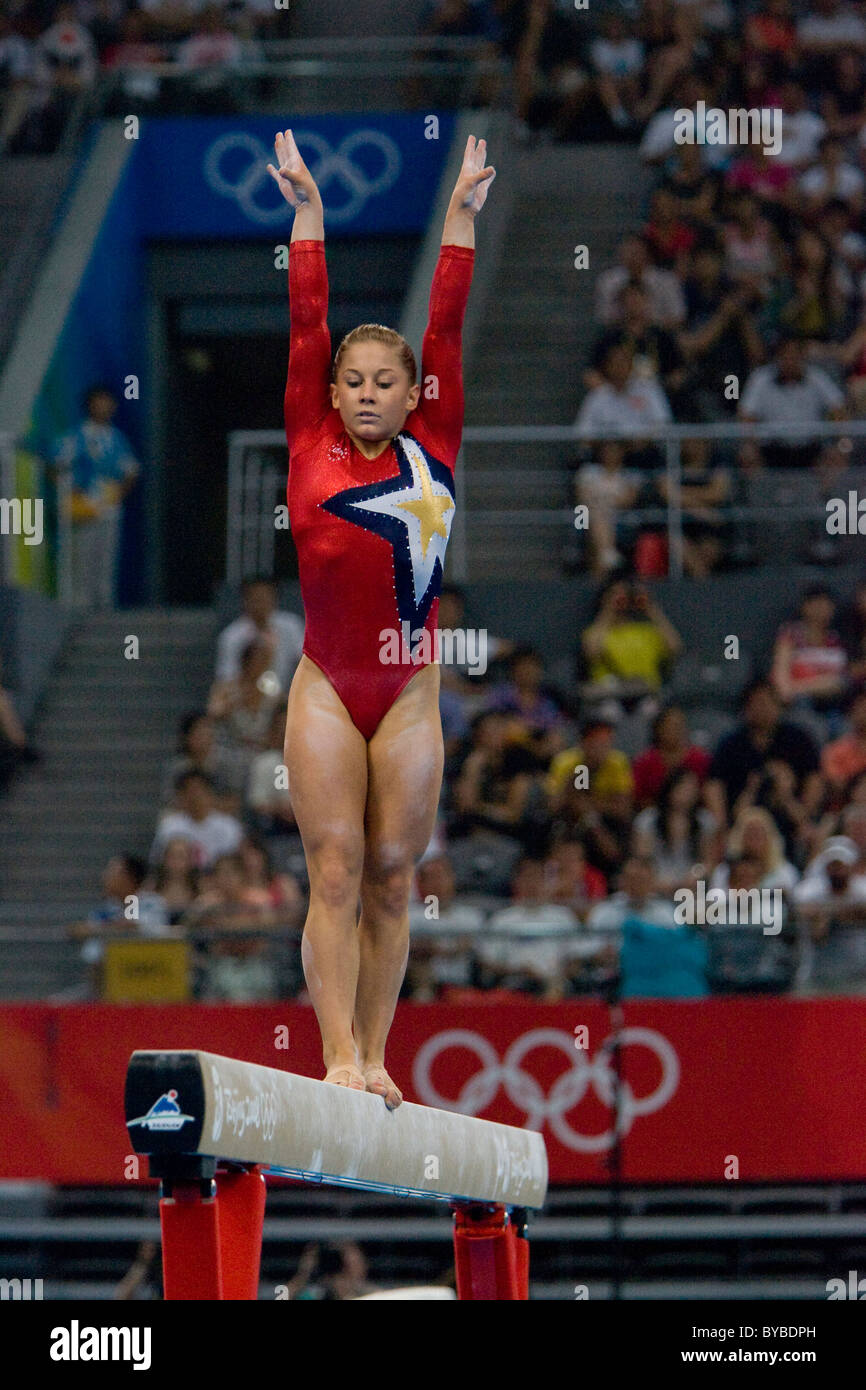 Shawn Johnson (USA) competing in the gymnastic qualification ...