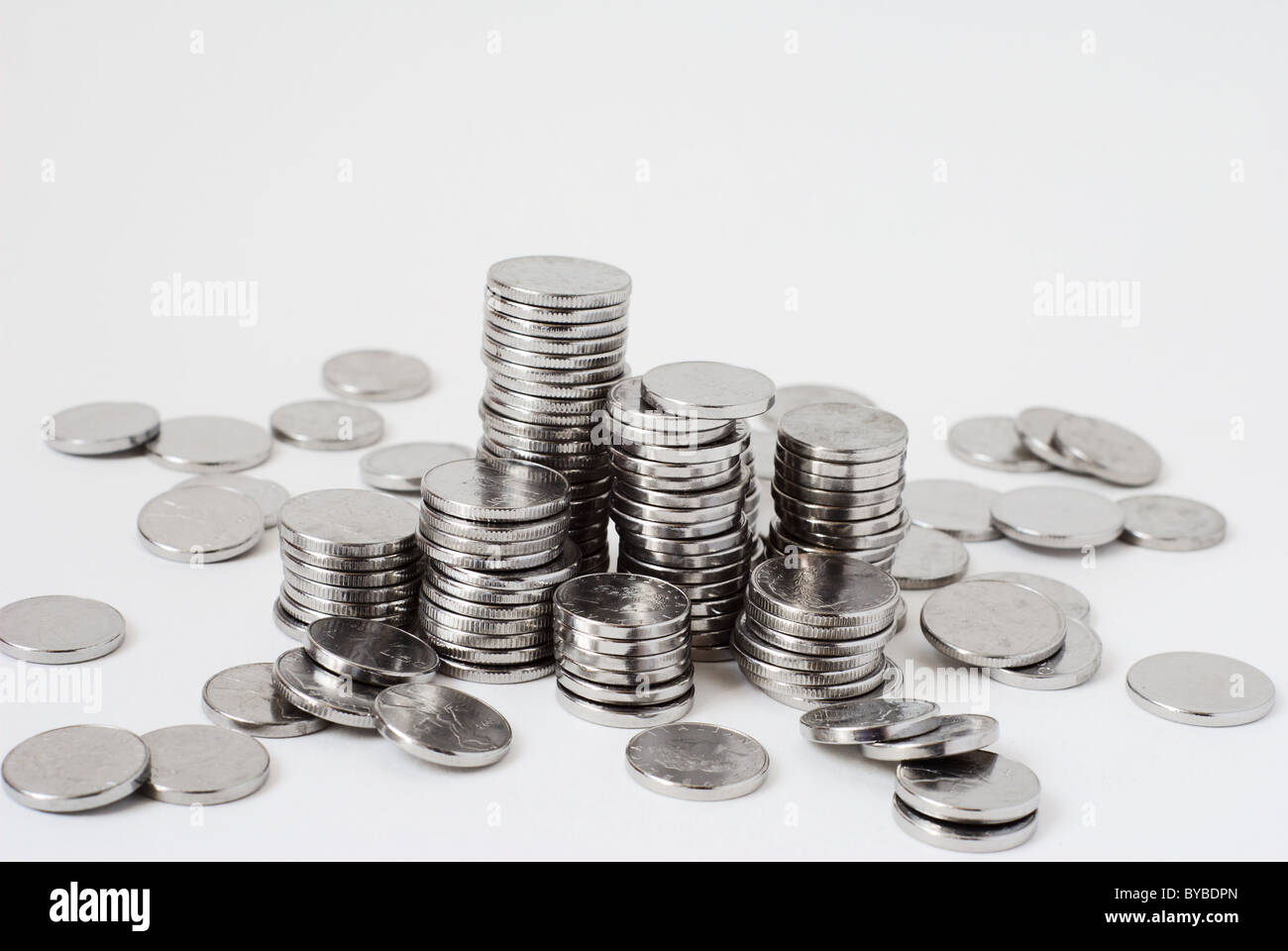 Metal coins stacks close-up photographed on white background Stock ...