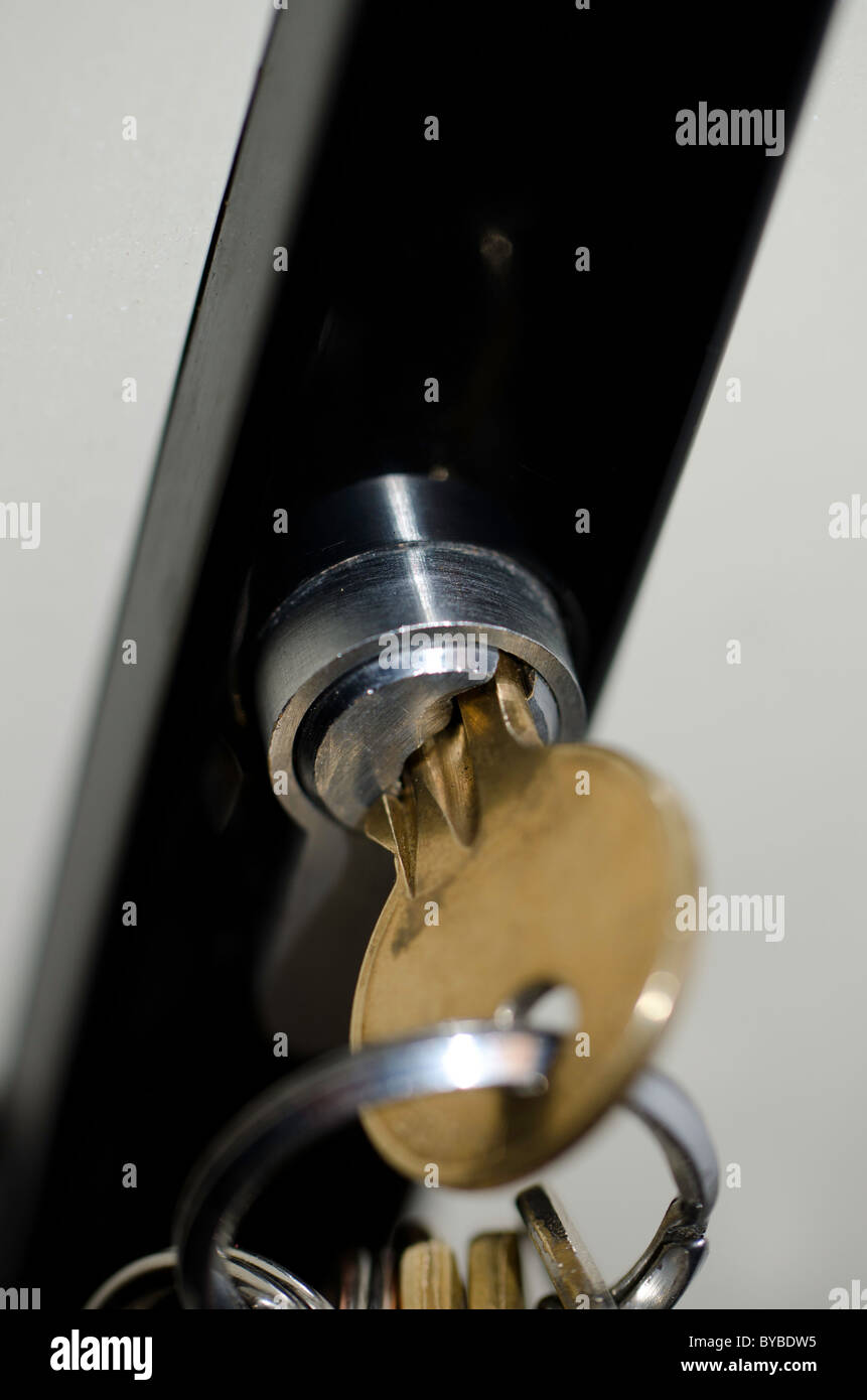 Key in Lock Stock Photo - Alamy