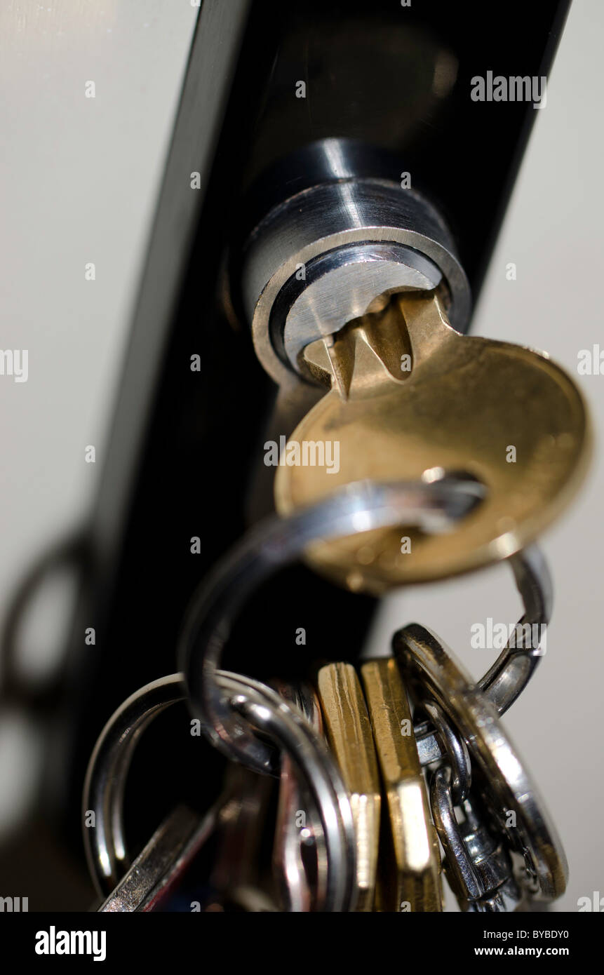 Key in Lock Stock Photo - Alamy