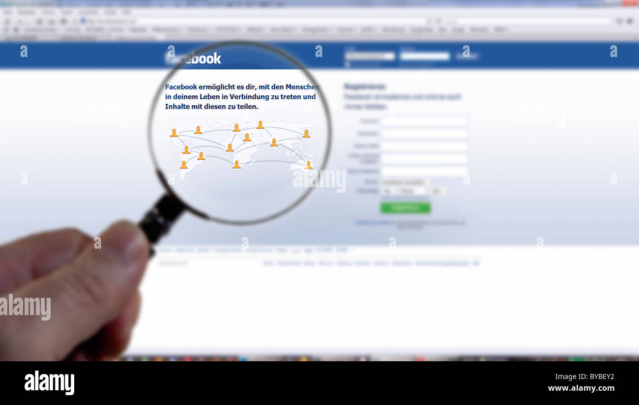 Searching for information on Facebook with a magnifying glass Stock ...