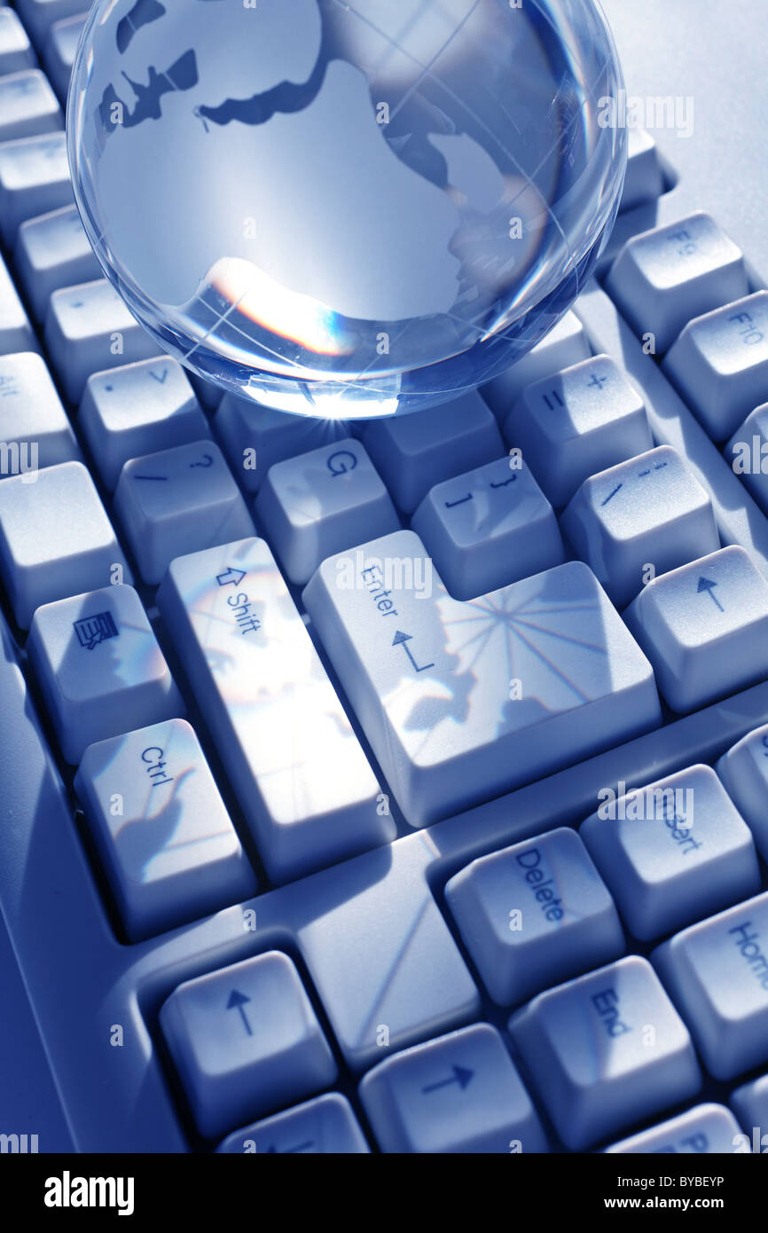 Blue Globe and Computer Keyboard for background Stock Photo - Alamy