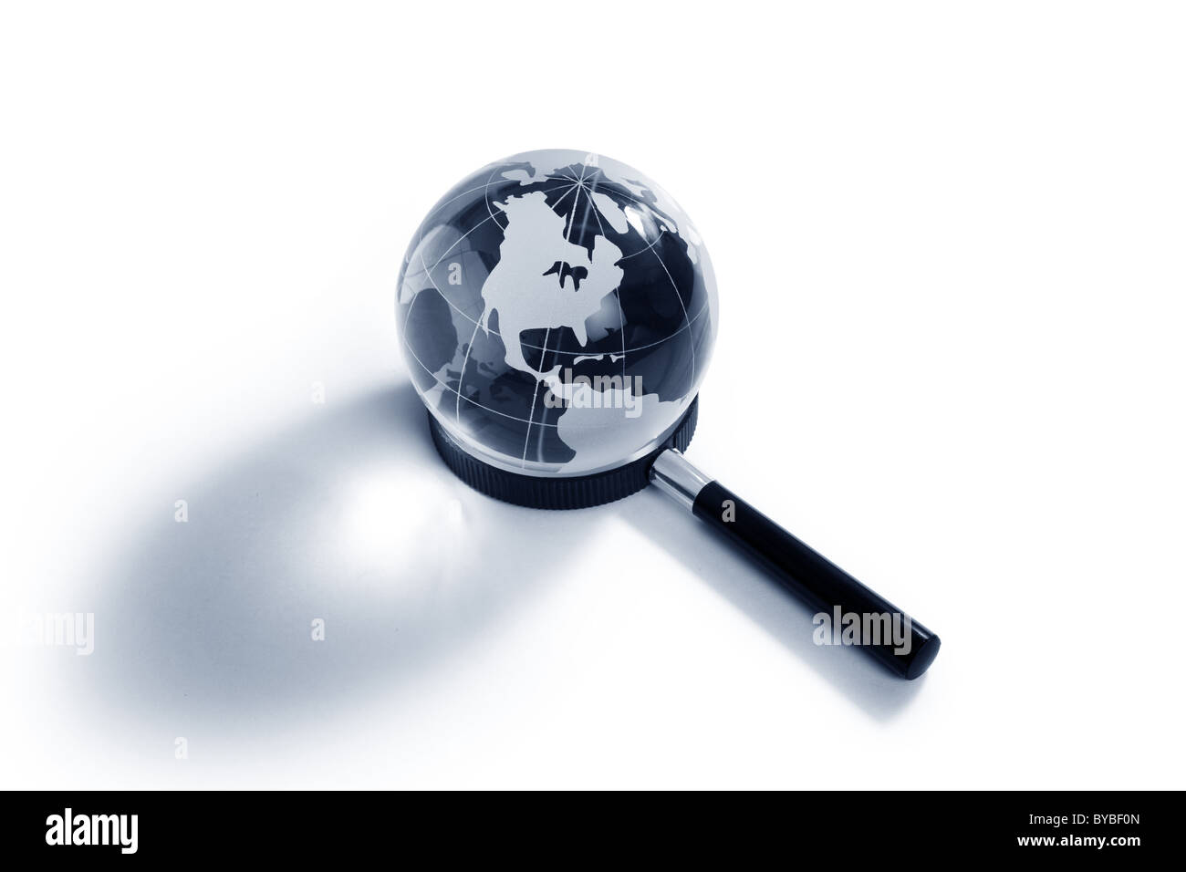Globe and Magnifying Glass for background Stock Photo - Alamy