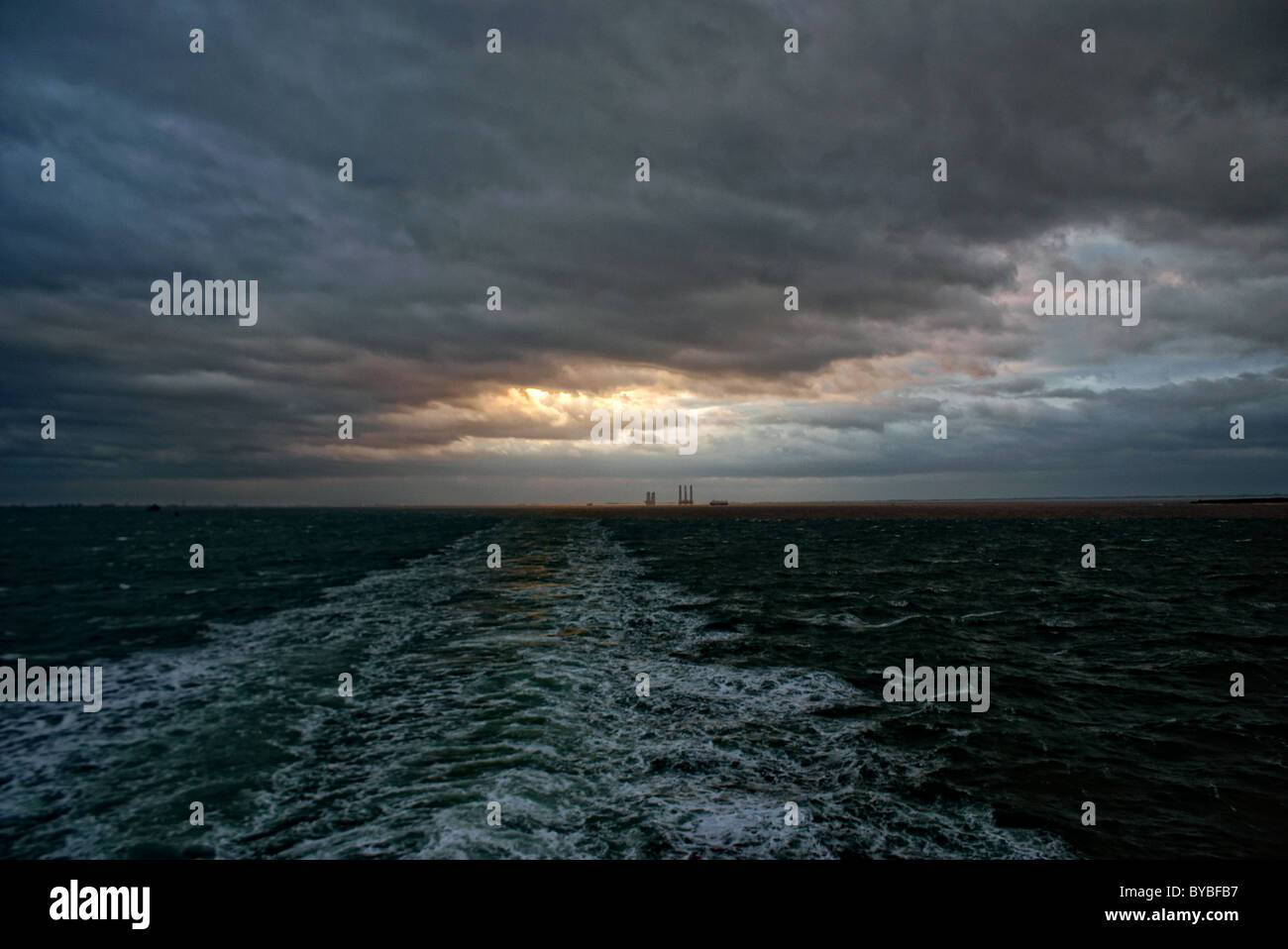 Ships wake sunset Stock Photo - Alamy