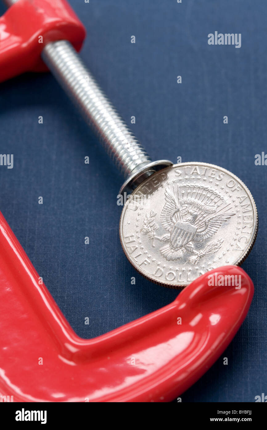 Vise Grip and coin close up Stock Photo - Alamy
