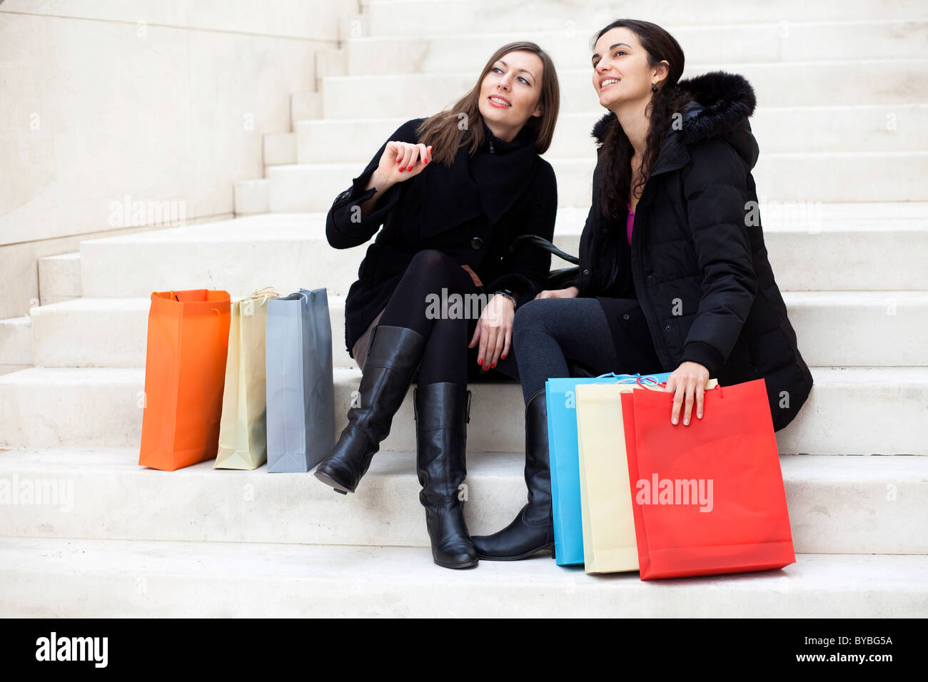Two women shopping Stock Photo - Alamy