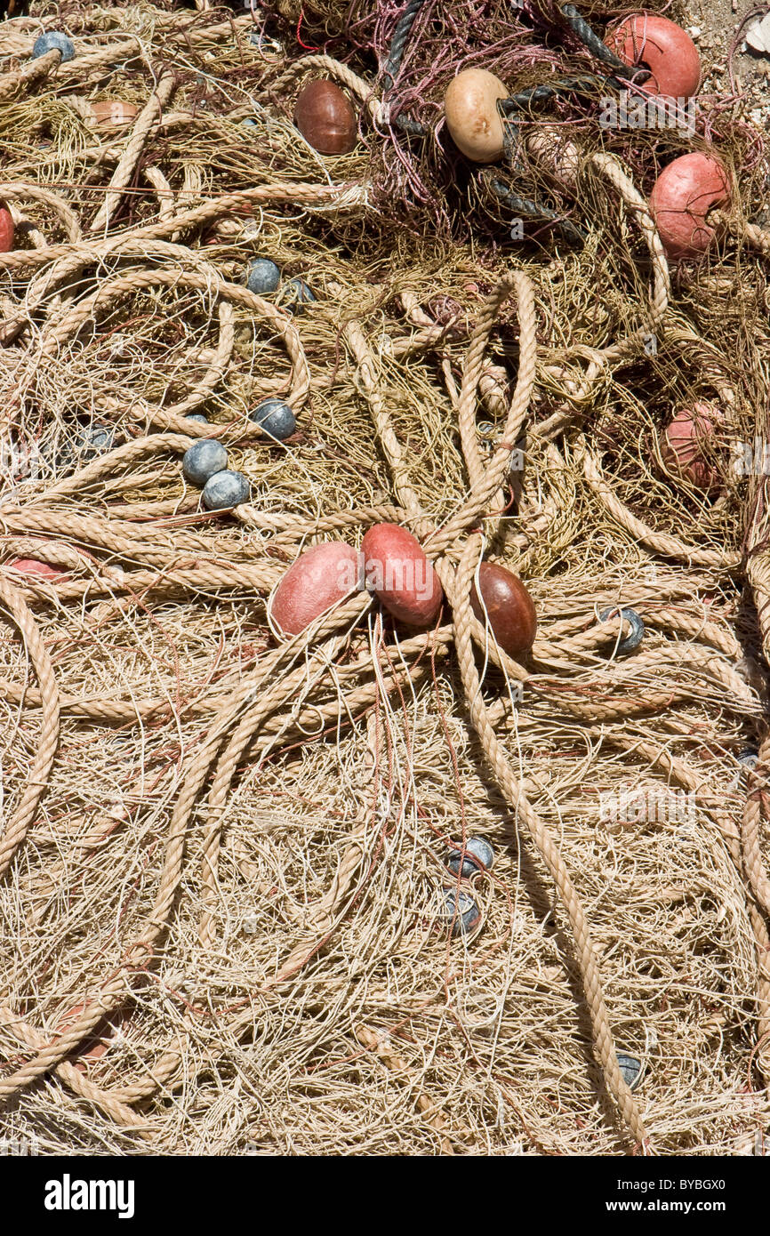 Old rope tangled with fishing nets Stock Photo - Alamy
