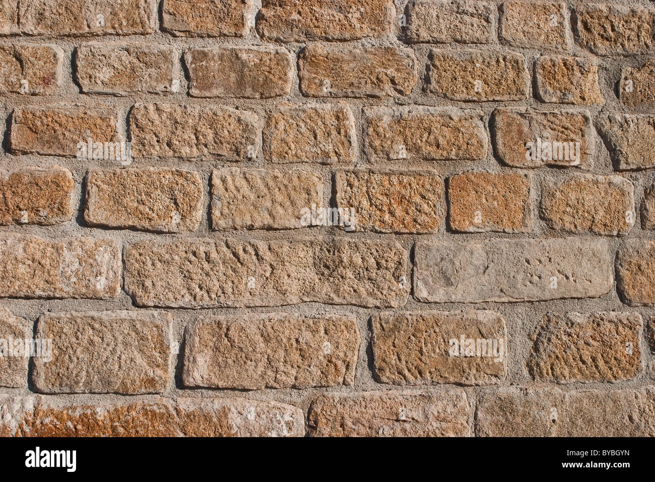 Sandstone brick wall background Stock Photo - Alamy
