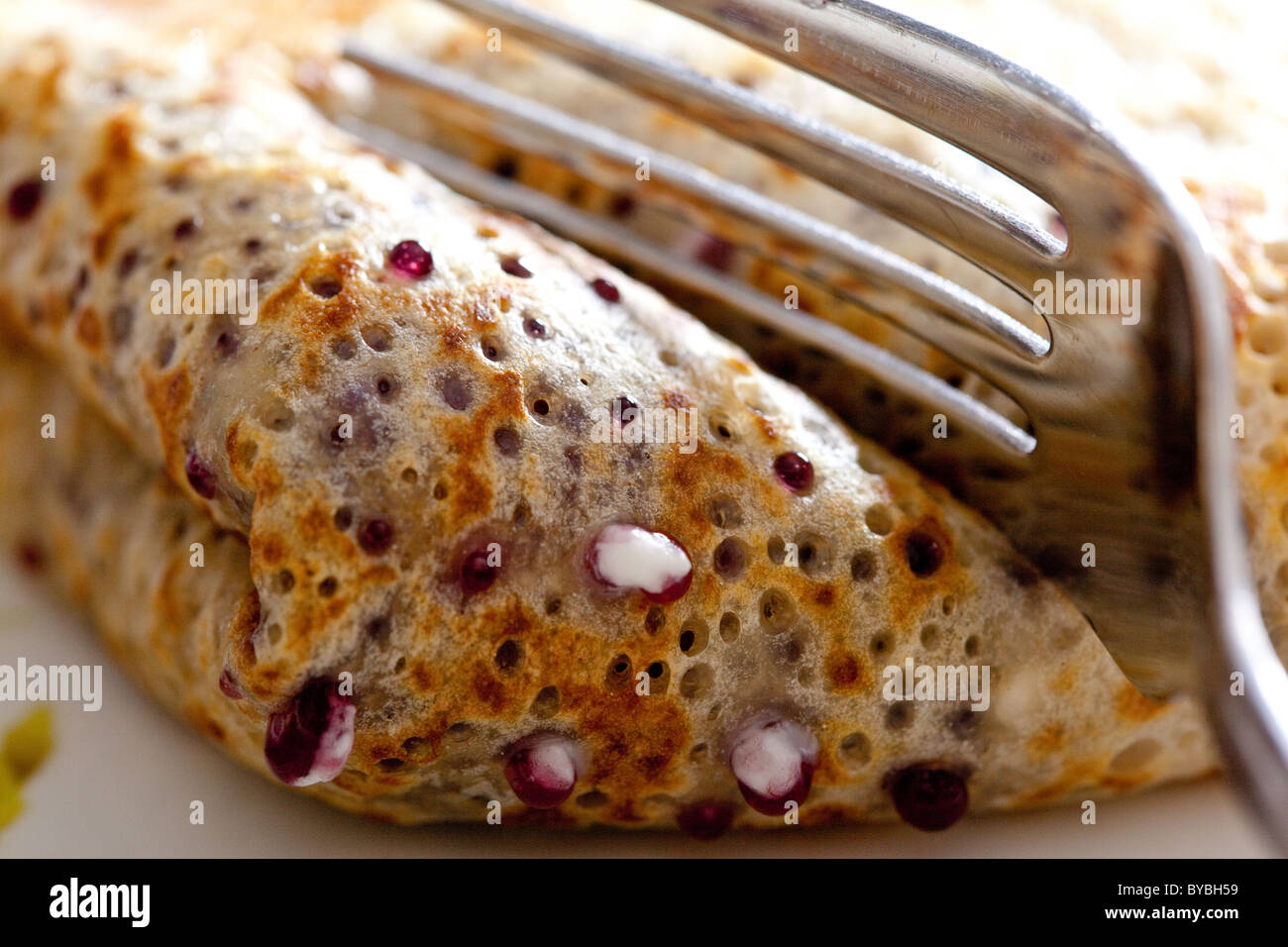 Icelandic pancake (similar to crepes) filled with whipped cream and ...