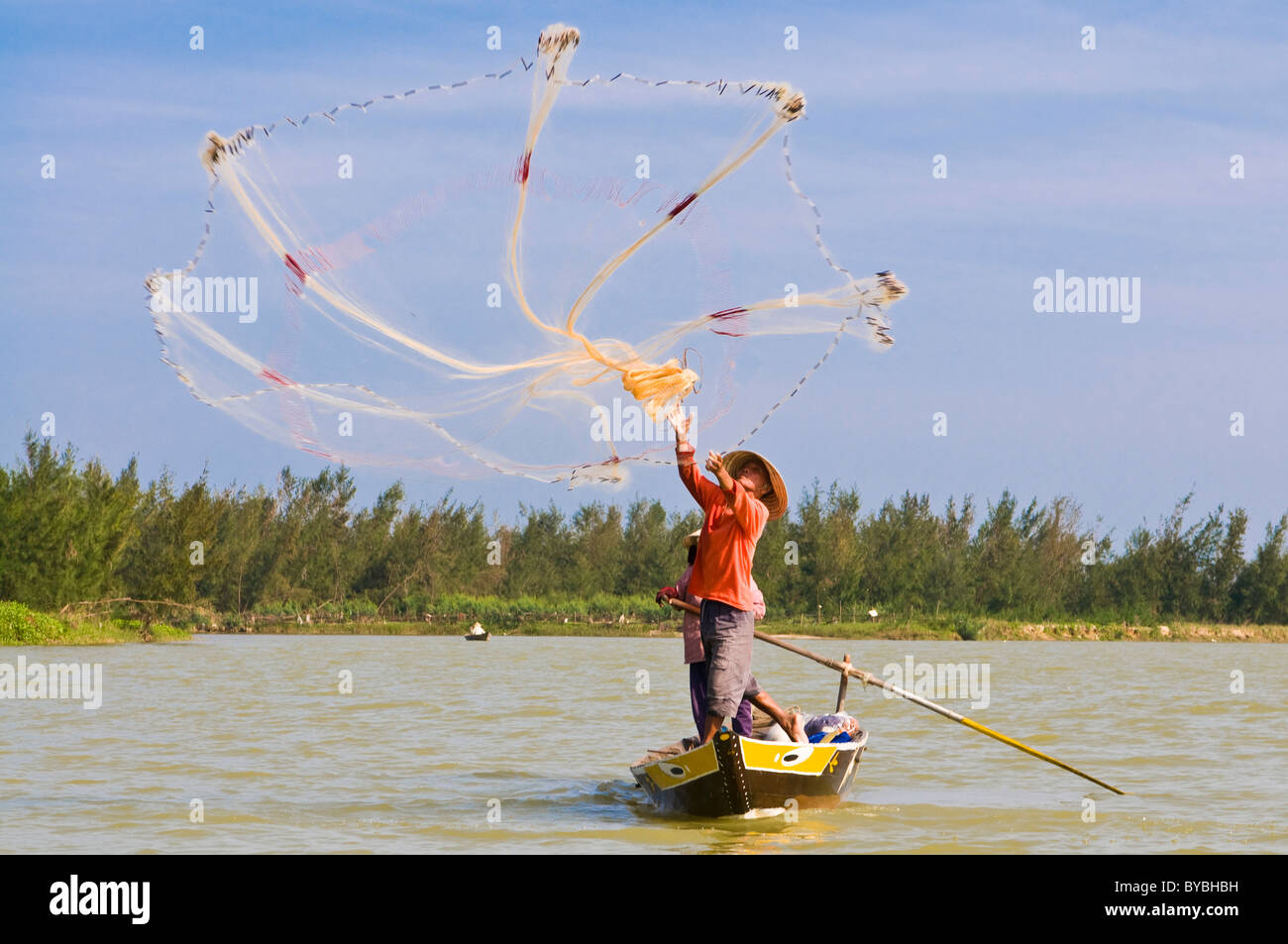 Fisherman throwing his net, Hoi An, Vietnam, Asia Stock Photo - Alamy