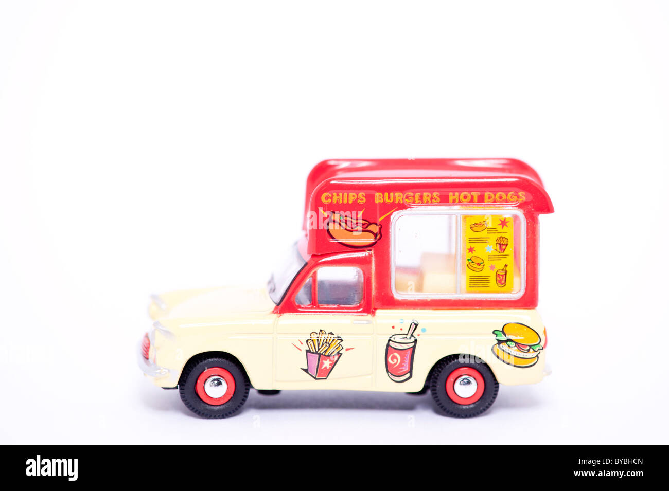 A toy model chips , burgers and hot dogs van on a white background ...