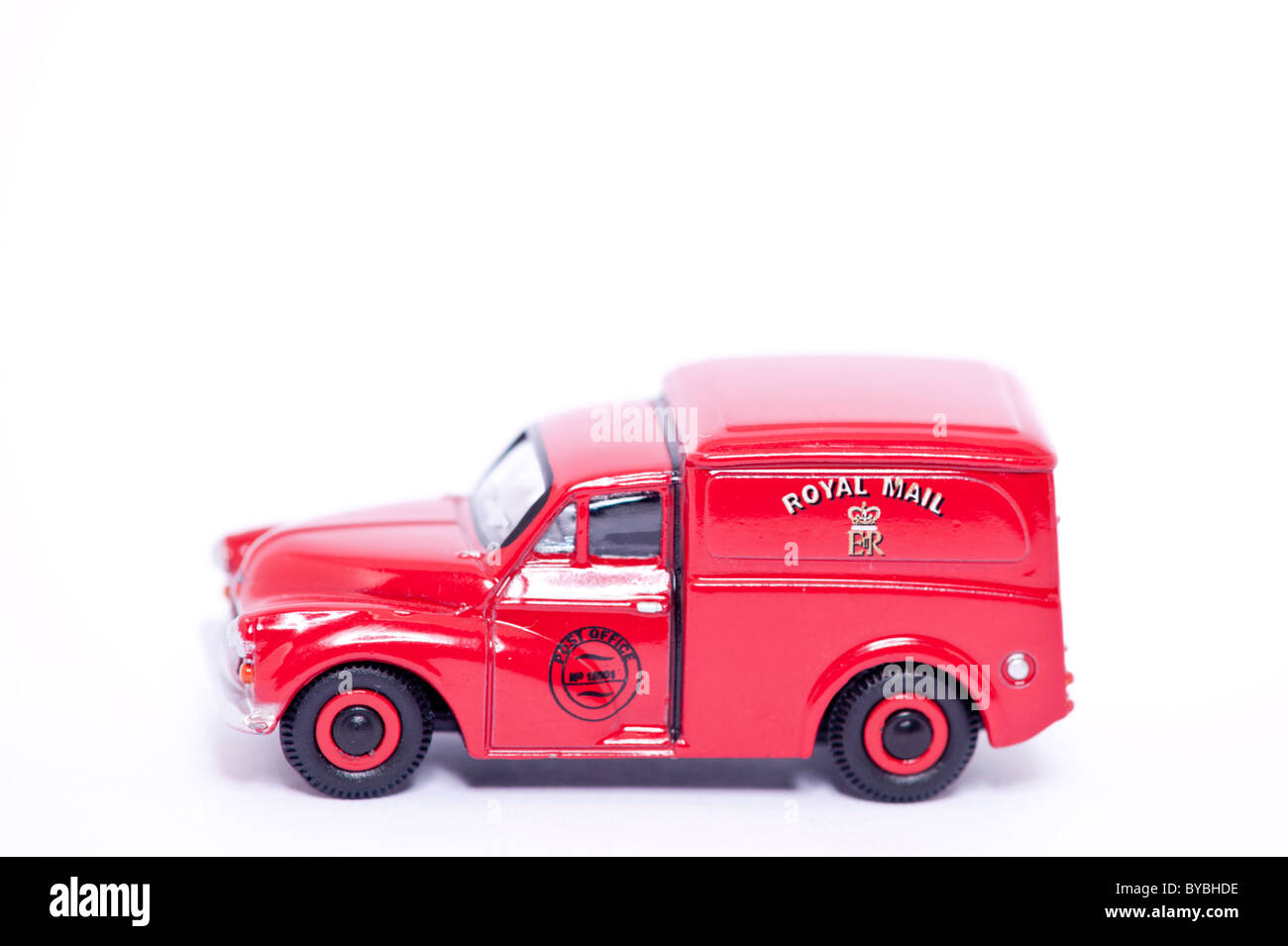 A toy model old fashioned Royal Mail post van on a white background ...