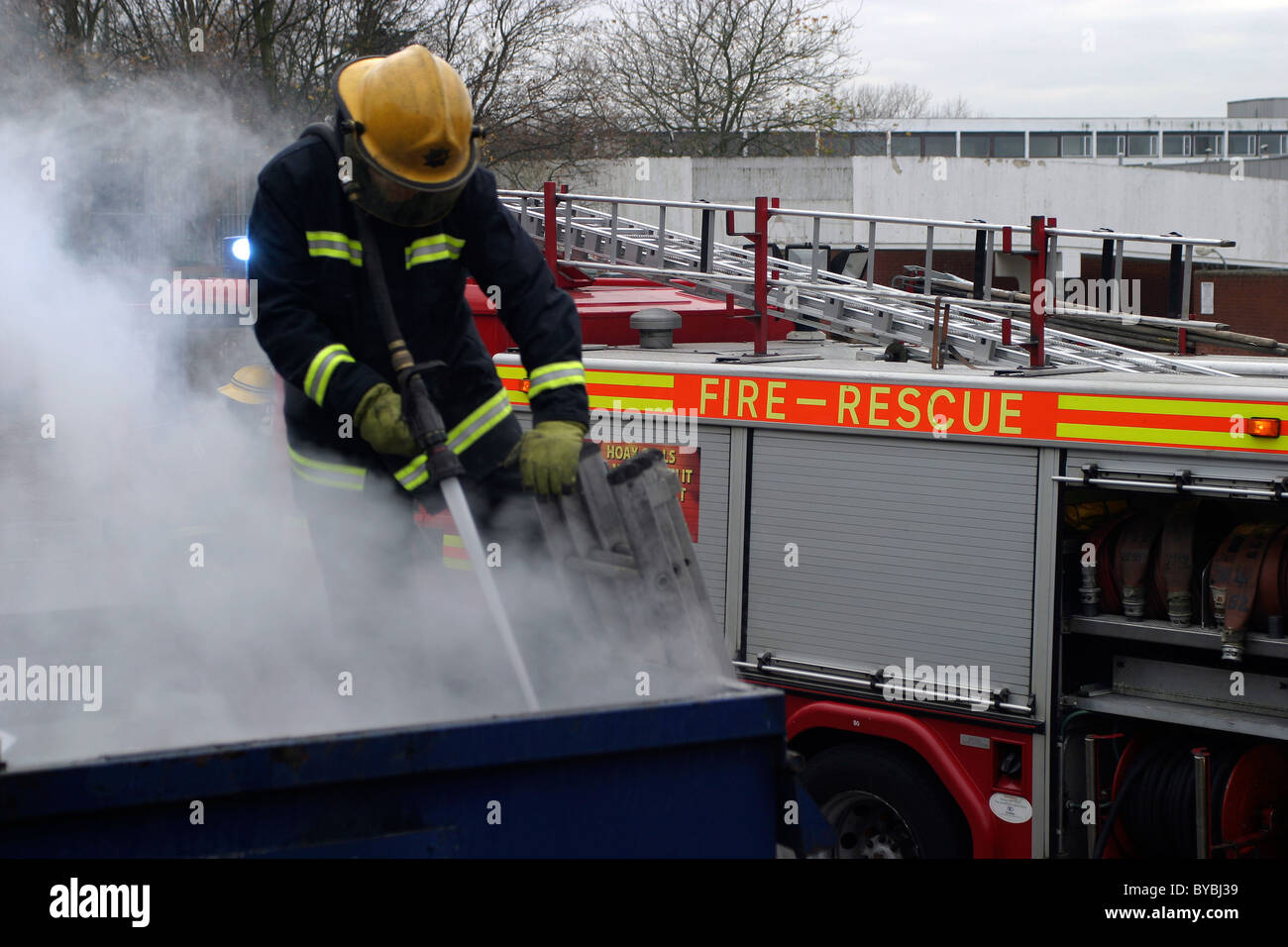 Fire in recycling bin Stock Photo - Alamy