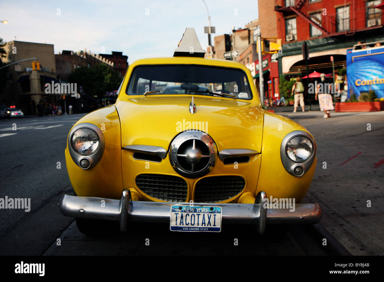 Retro 1950 yellow Studebaker Champion parked in streets of Manhattan ...