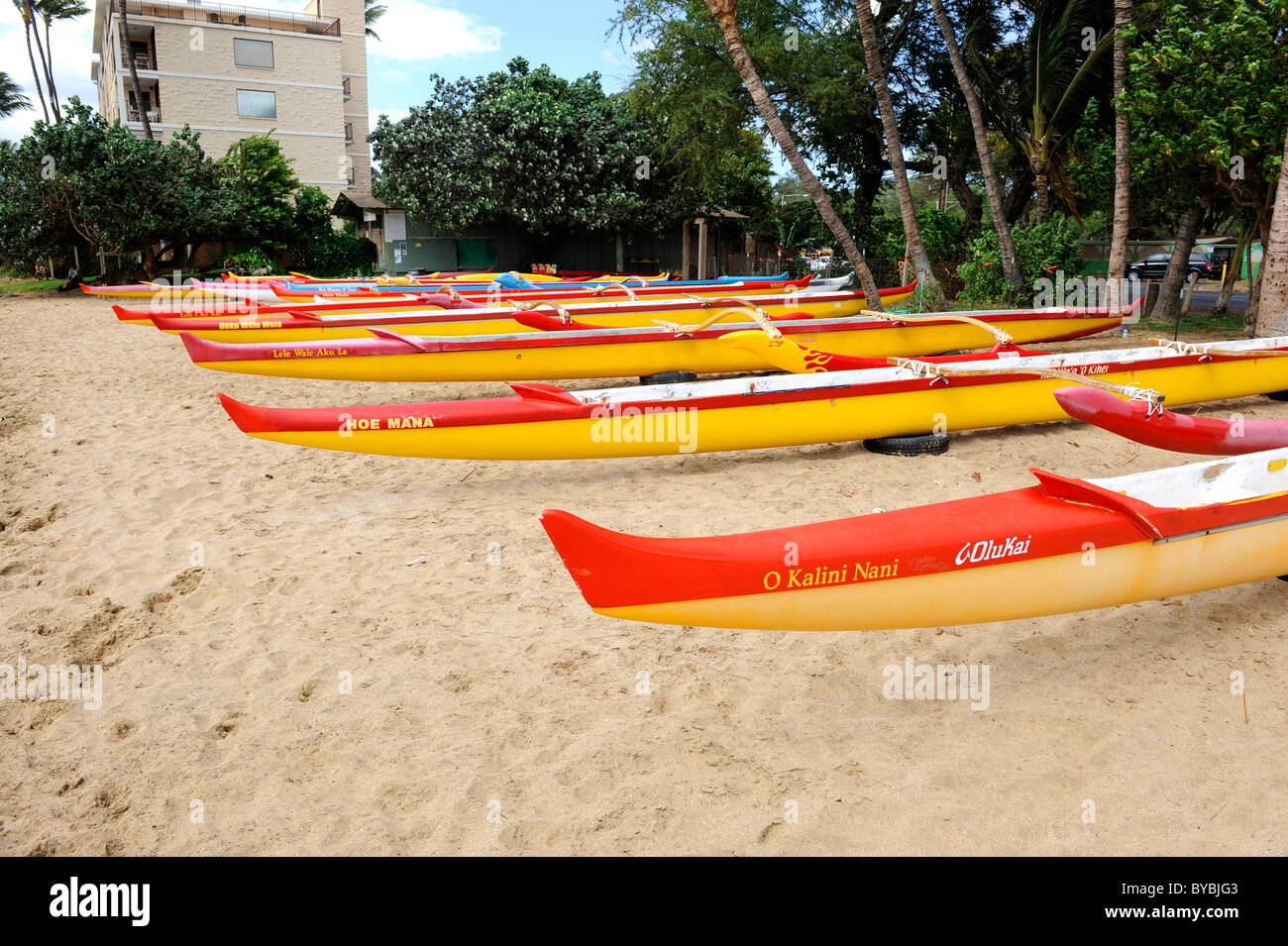 Yellow and Red Outriggers on beach Kihei Maui Hawaii Pacific Ocean ...