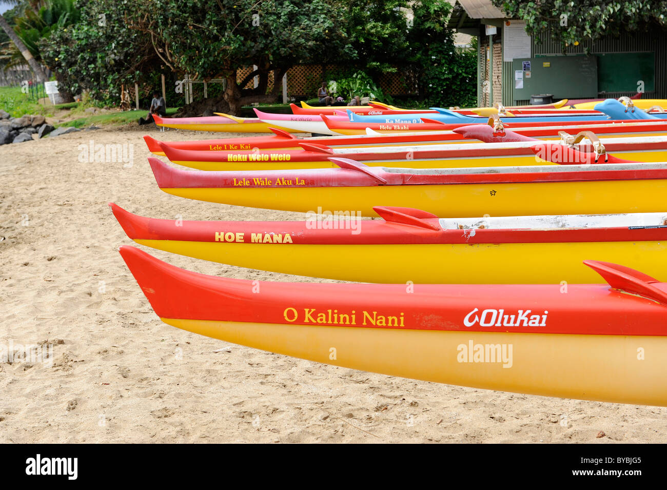 Yellow and Red Outriggers canoe on beach Kihei Maui Hawaii Pacific ...