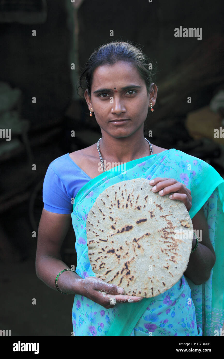 young lady holding a big chapati Andhra Pradesh South India Stock Photo ...