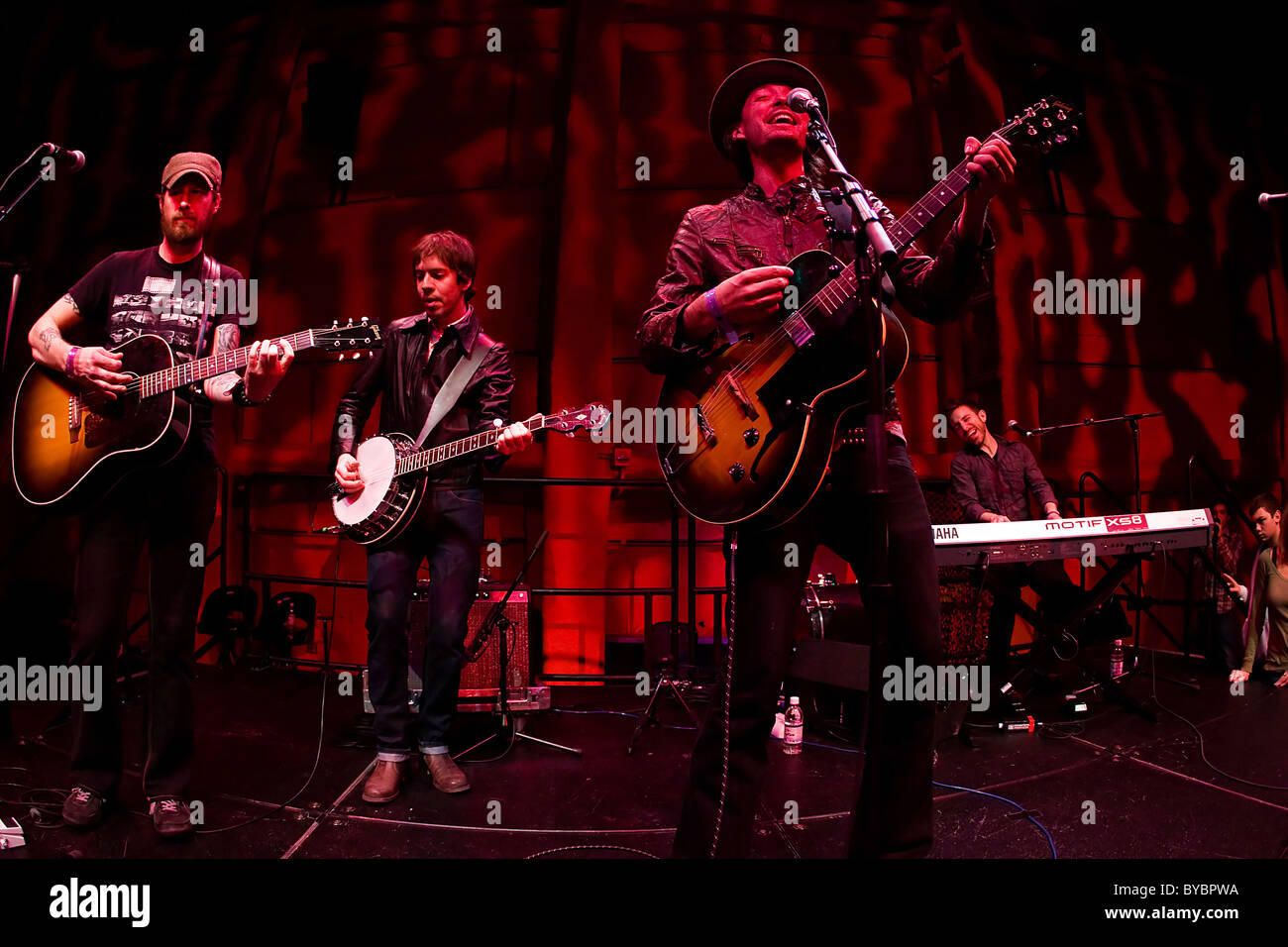 Rock Band Hugo performing in concert Stock Photo - Alamy
