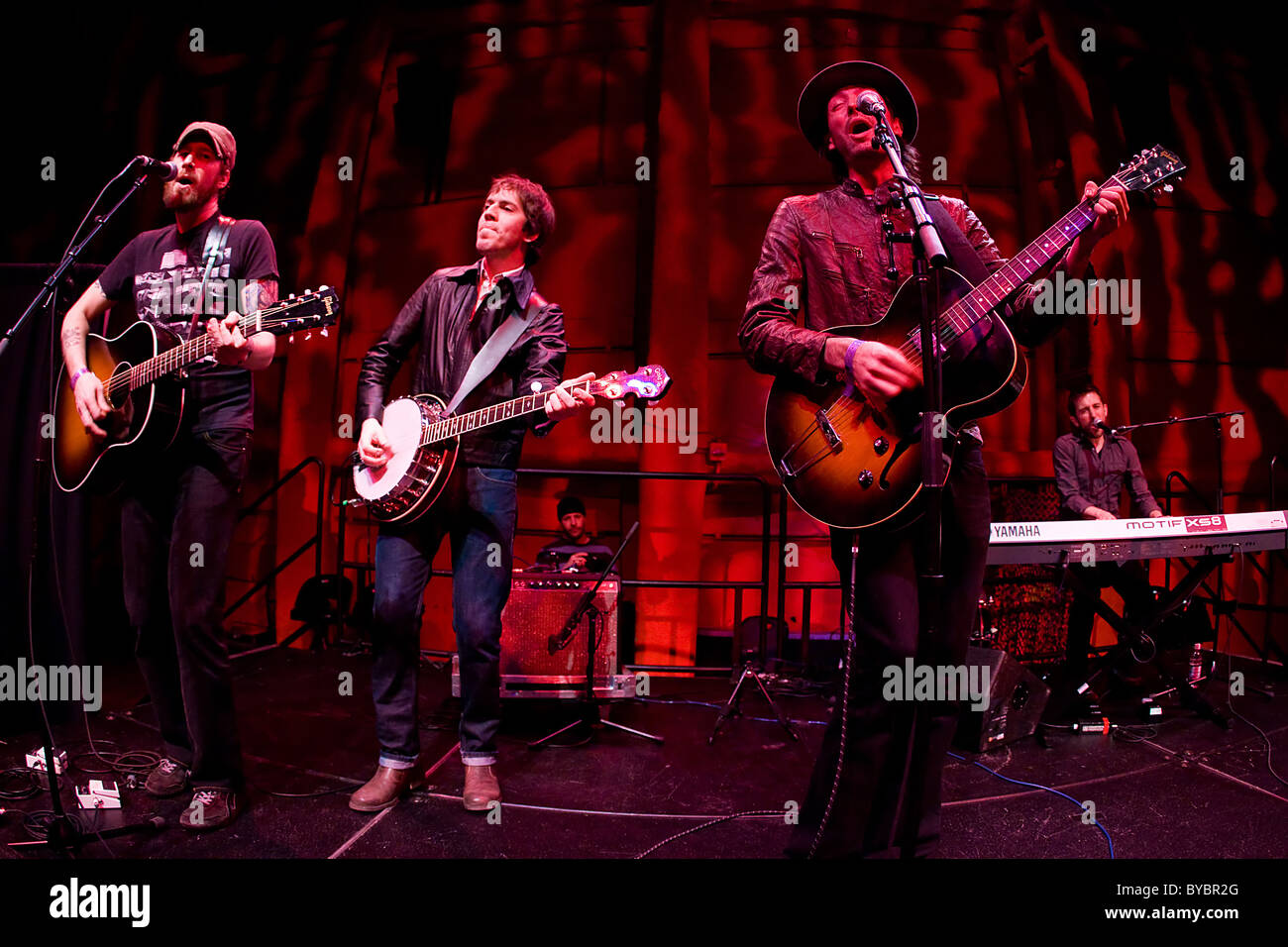 Rock Band Hugo performing in concert Stock Photo - Alamy