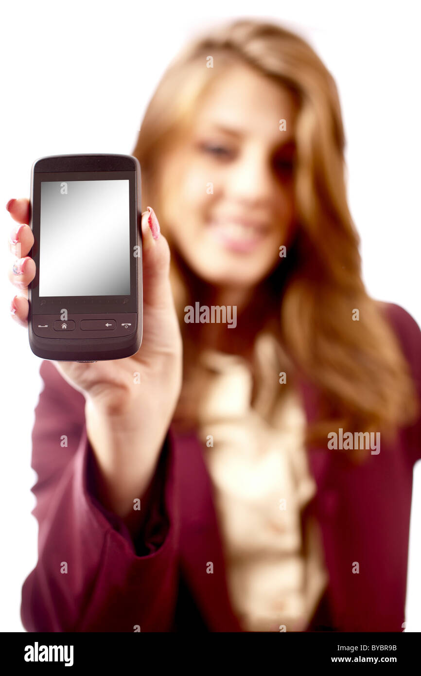 Young businesswoman showing a PDA or smartphone to the camera ...