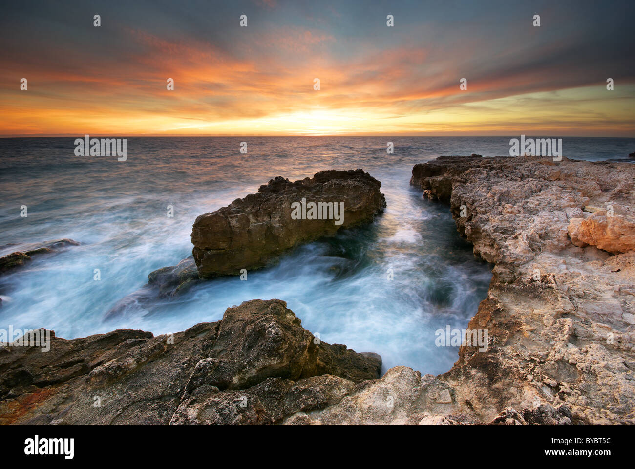 Beautiful seascape. Sea and rock at the sunset. Nature composition ...