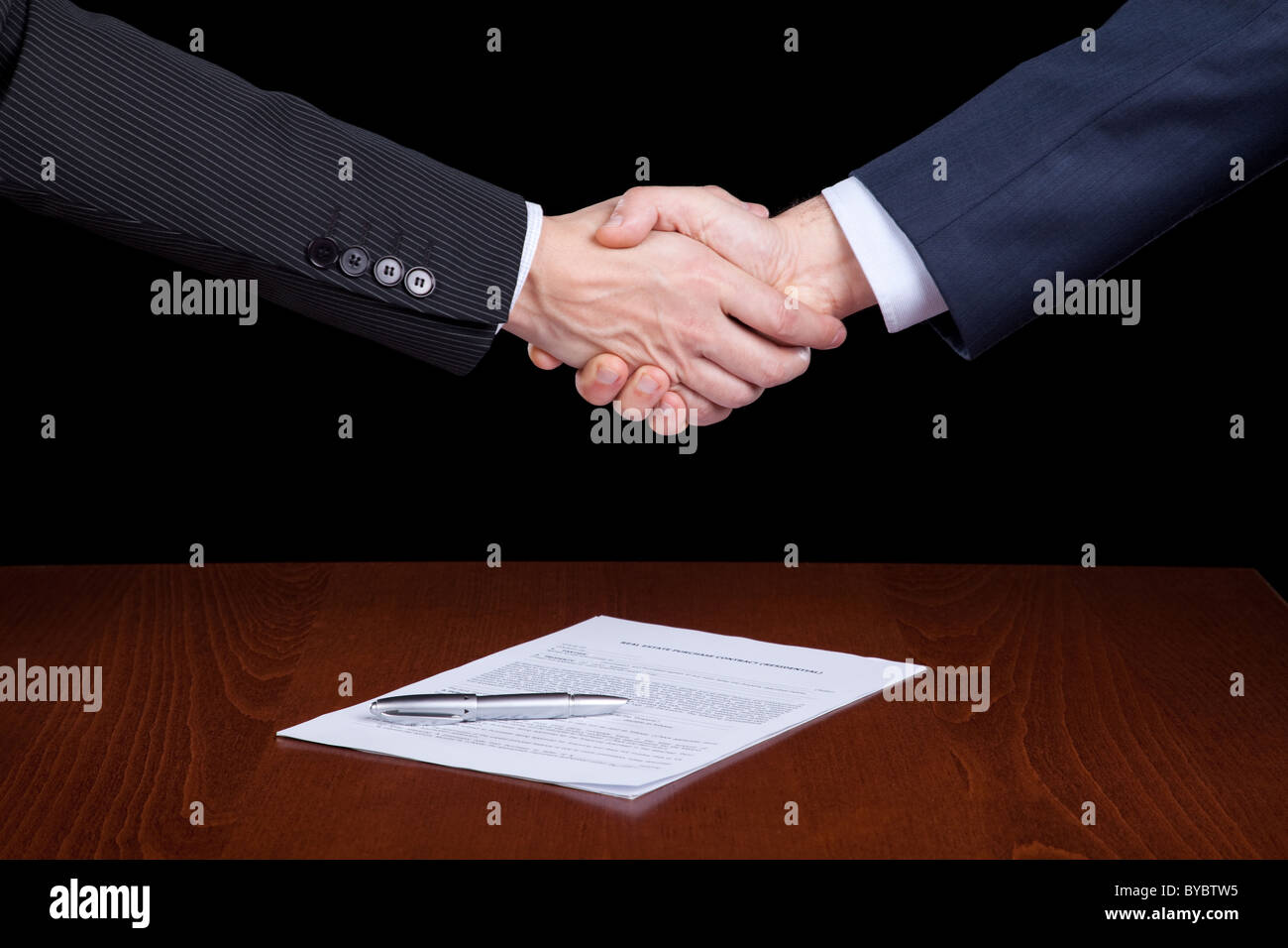 Handshake two partners after contract hi-res stock photography and ...