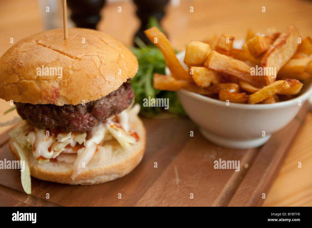 burger hand made with chips Stock Photo - Alamy