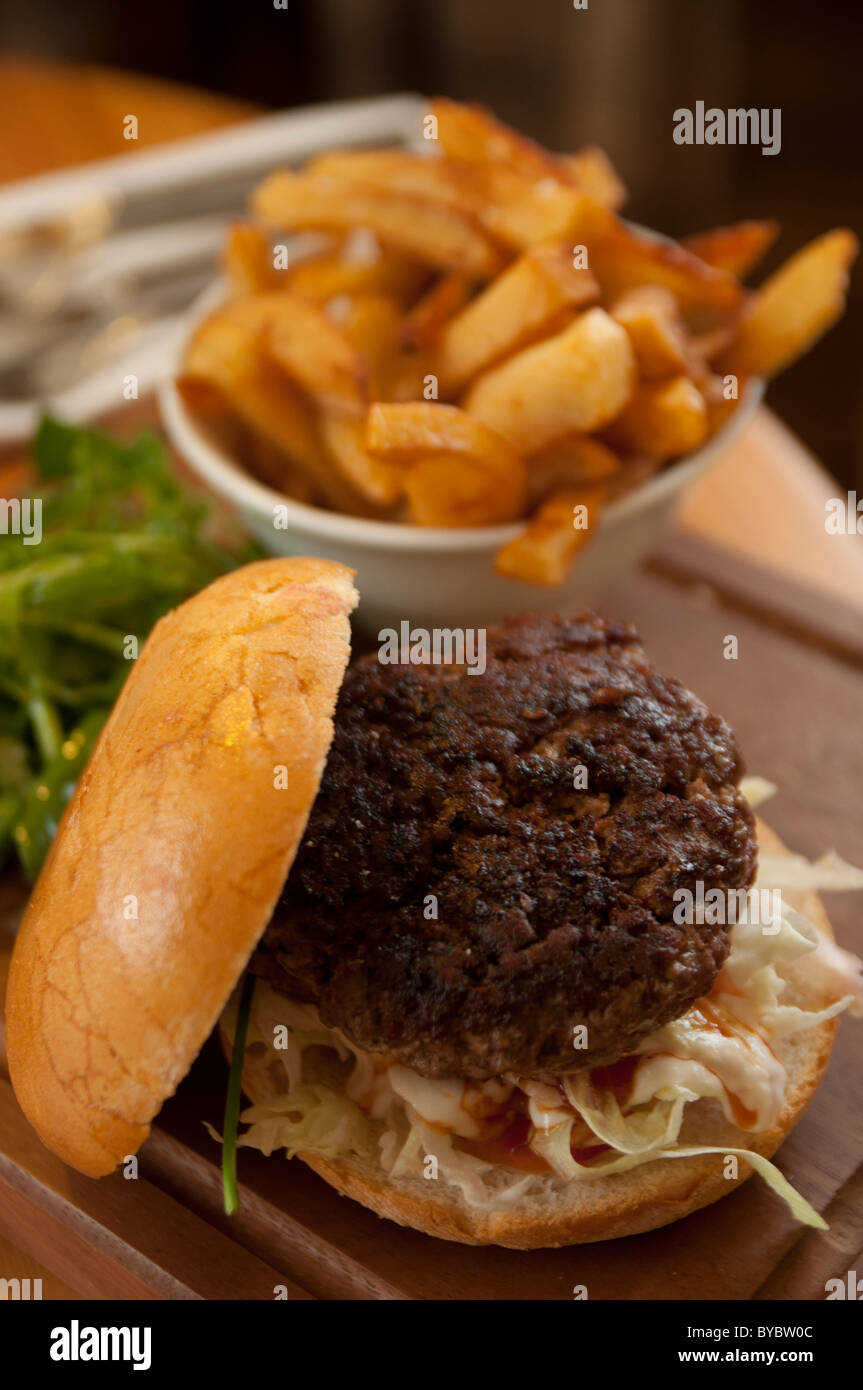burger hand made with chips Stock Photo - Alamy