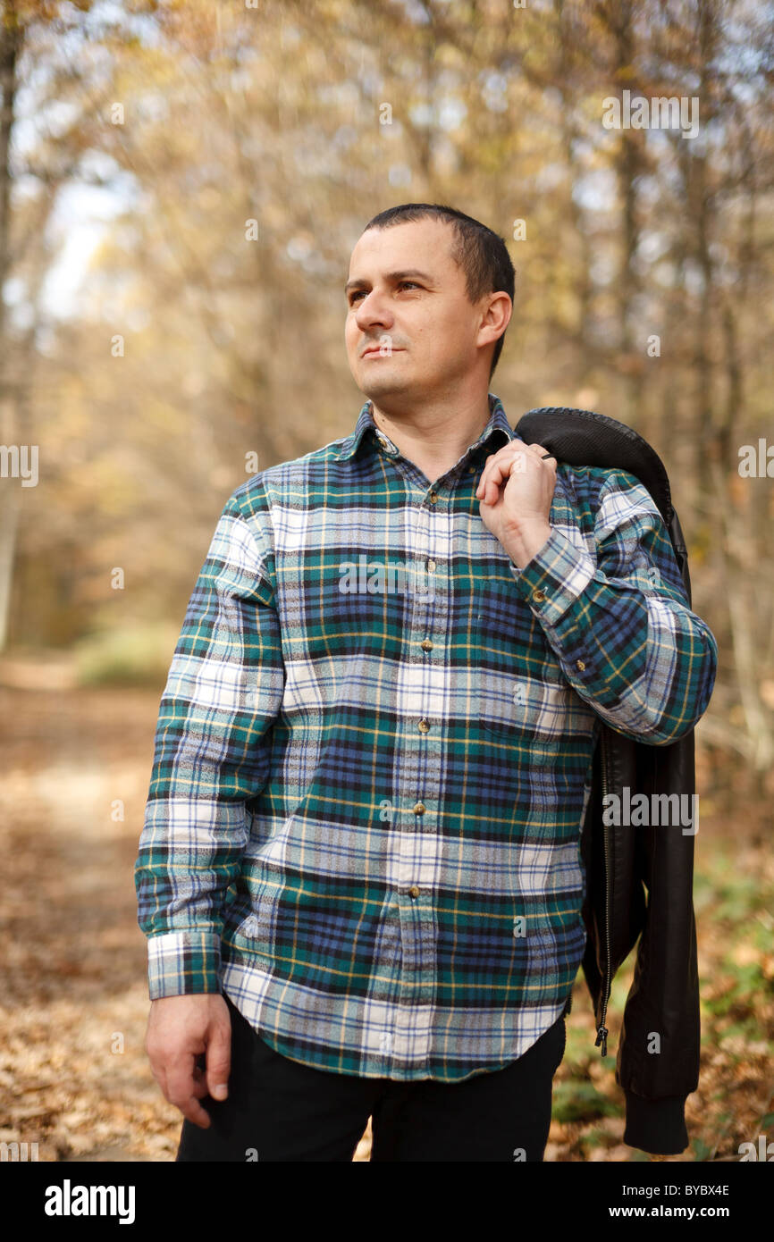 Portrait of a young man outdoor in the forest Stock Photo - Alamy
