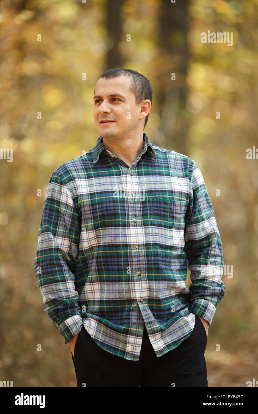 Portrait of a young man outdoor in the forest Stock Photo - Alamy