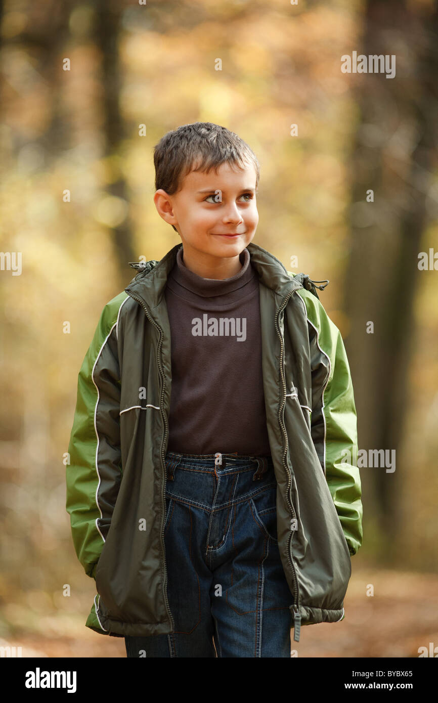 Cute kid taking a walk outdoor in the forest Stock Photo - Alamy