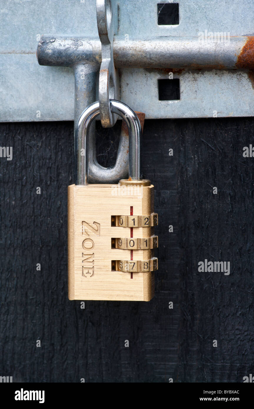 Metal Combination Padlock Securing a Metal Gate Bolt Stock Photo - Alamy