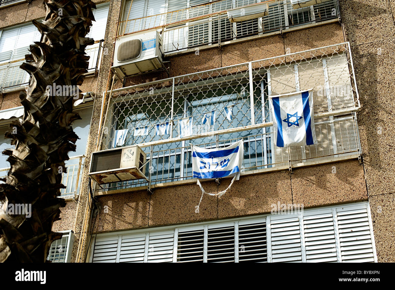 israeli flag and sign saying shalom (peace) in hebrew hanging from the ...