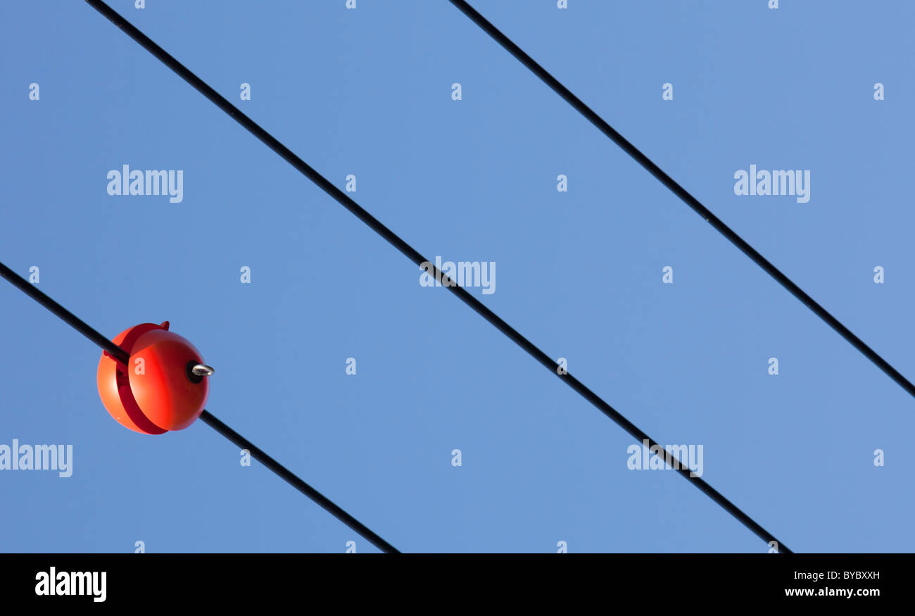 Red power line marker ball prevents accidental bird and aircraft ...